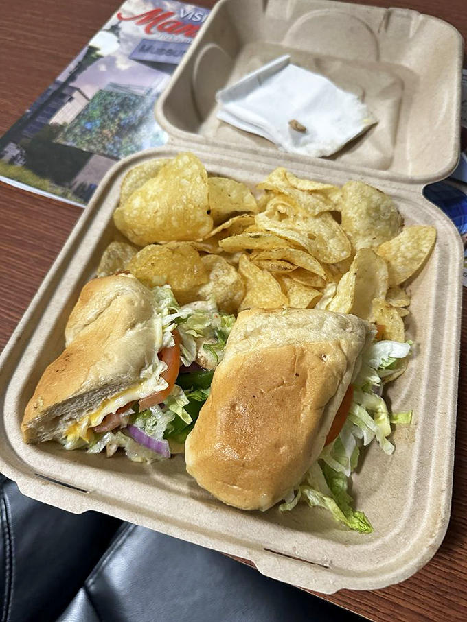 A sandwich container that looks like it's about to serve jury duty at the Supreme Food Court, delivering veggie-packed justice to hungry citizens.