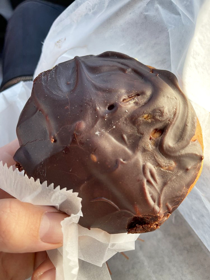 This chocolate-topped Bavarian cream donut isn't just breakfast&mdash;it's therapy. The kind your health insurance should really cover.