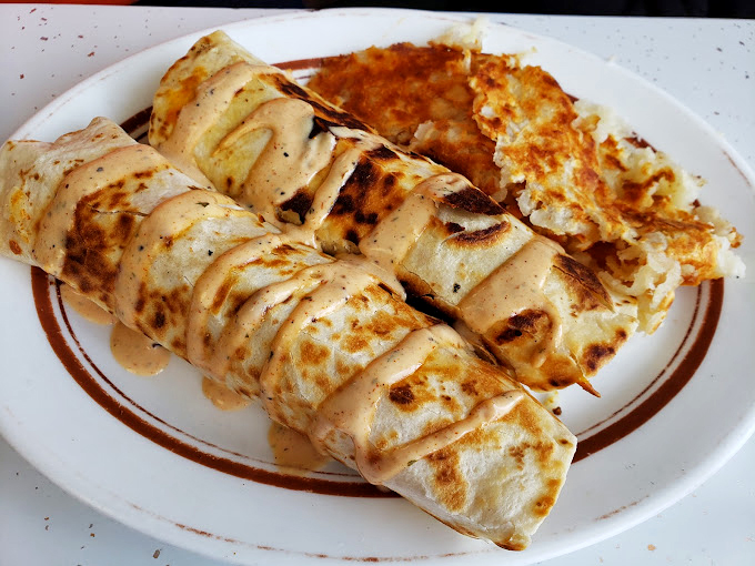 Not all heroes wear capes &ndash; some come wrapped in a tortilla with perfectly seasoned fillings and a side of creamy grits.