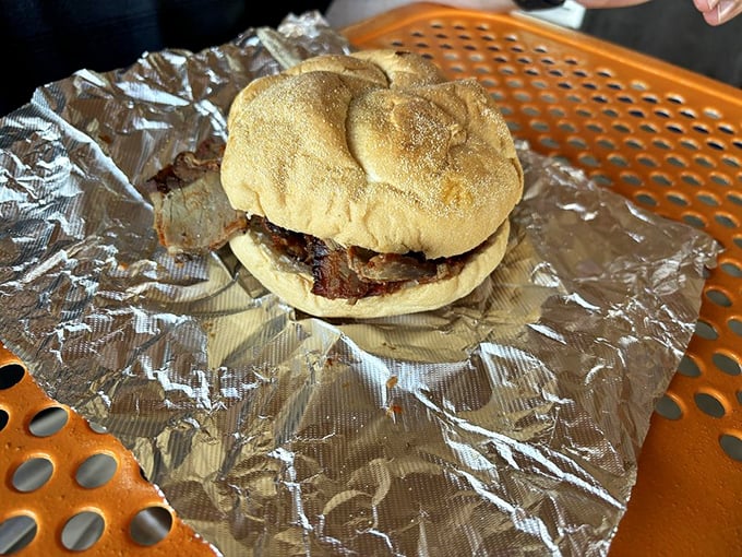 The brisket sandwich—where simplicity meets perfection. Just meat, bun, and the promise that napkins will absolutely be necessary.