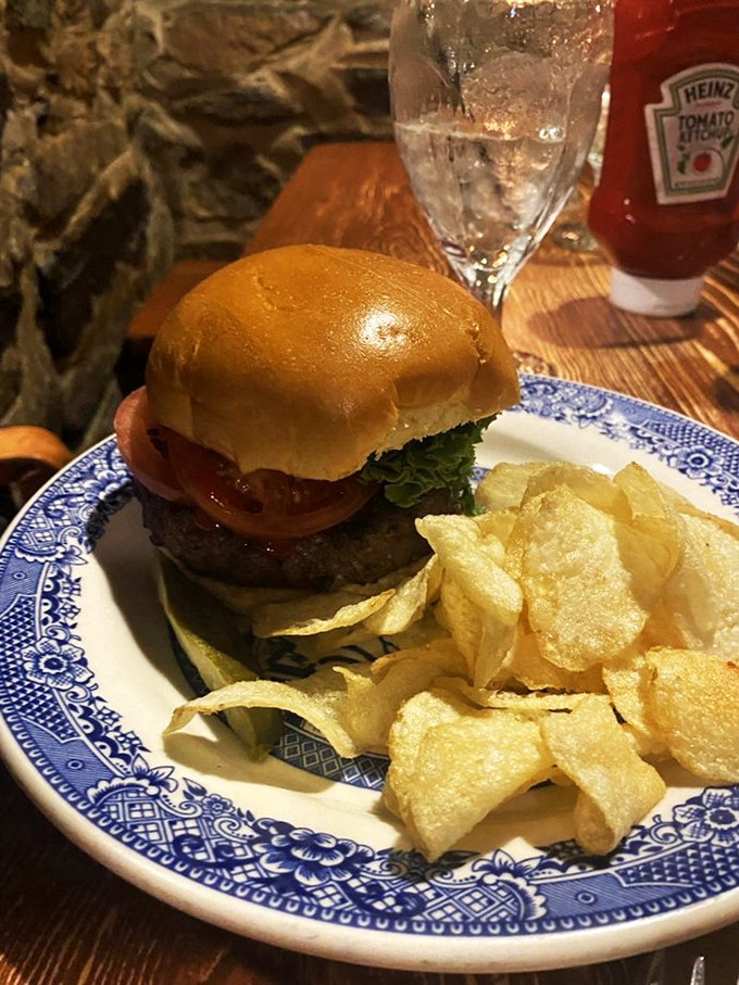 Even the burger pays homage to history—substantial, honest, and served on blue willow china that your grandmother would approve of.
