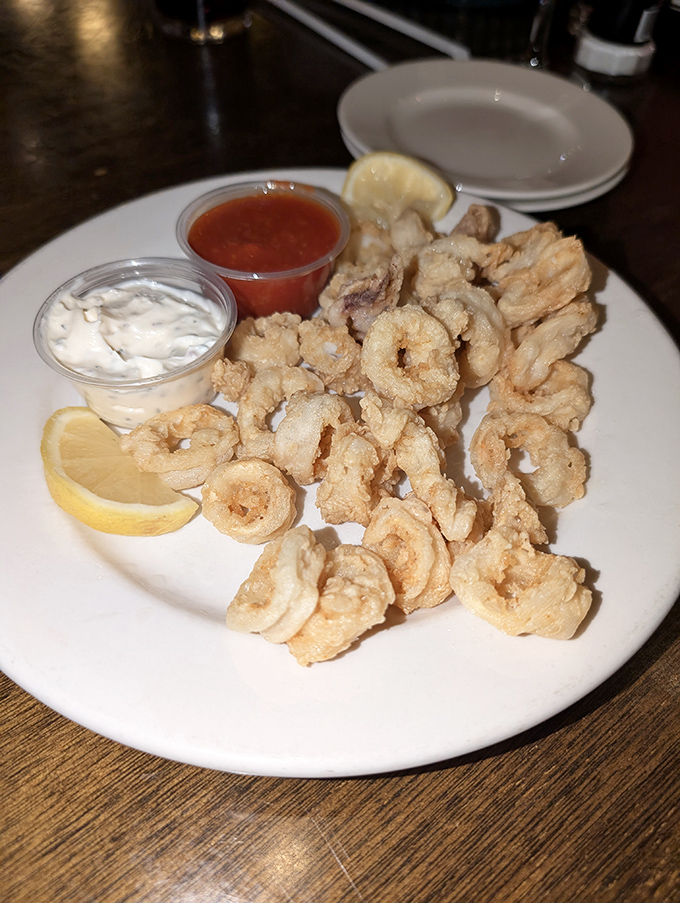 Calamari so tenderly fried it makes you wonder why other restaurants turn it into rubber bands with breadcrumbs.