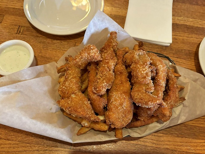 These aren't just chicken tenders&mdash;they're golden brown happiness sticks. Crispy on the outside, tender within, they're comfort food in its purest form.