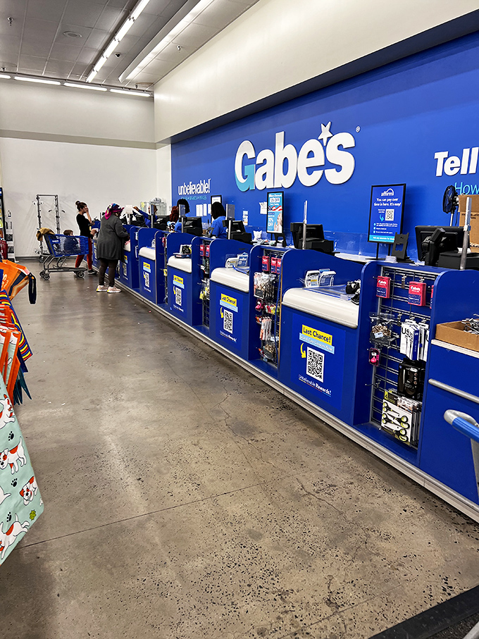 The blue checkout counter&mdash;final destination for victorious bargain hunters and their newfound treasures.