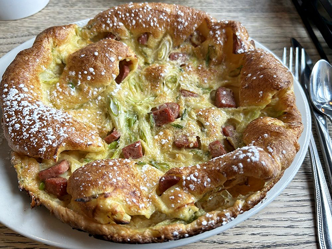 French toast that deserves its own Instagram account. Fresh berries and whipped cream transform bread into something worth setting an alarm for. 