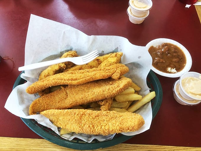 Golden-crusted catfish strips that could make even non-seafood lovers reconsider their life choices. Crispy outside, tender inside—the textbook definition of fried perfection.