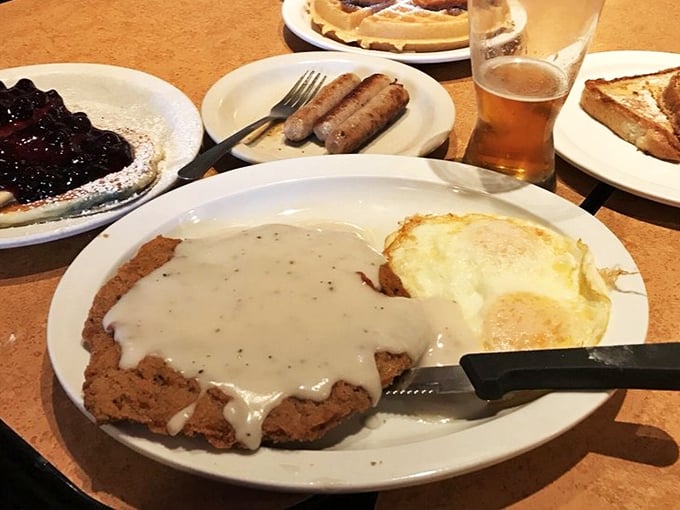 Country fried steak smothered in gravy—the breakfast equivalent of a warm hug from your favorite aunt who never counted calories.
