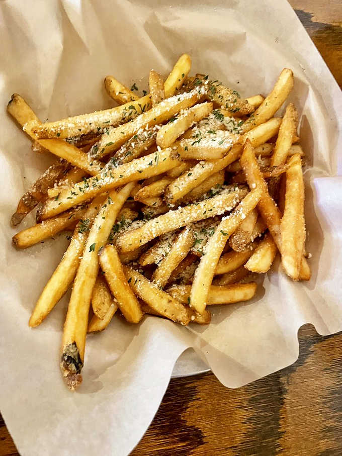 These aren't ordinary fries&mdash;they're golden treasures dusted with parmesan and herbs. Each crispy bite is a reminder that simple pleasures are often the most profound.