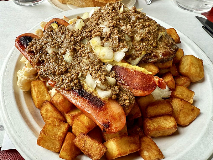 Red hots nestled among golden potatoes, crowned with that signature meat sauce&mdash;this is Rochester's version of a royal feast.