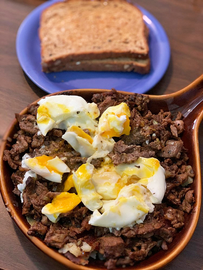 A skillet that means business. Those eggs aren't just sitting on that meat&mdash;they're having a flavor conference with serious agenda items.