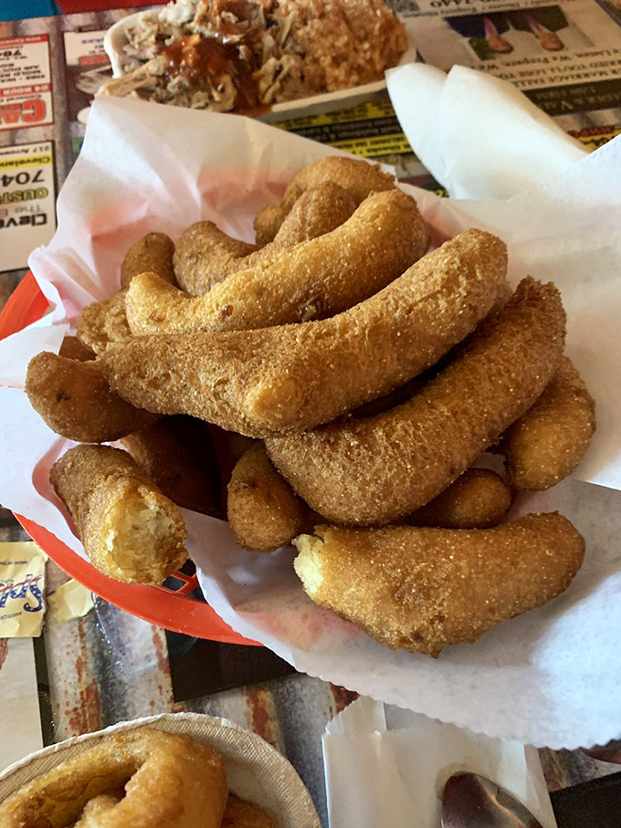 Hushpuppies so perfectly golden they deserve their own trophy case&mdash;crispy outside, tender inside, and worth every single calorie.