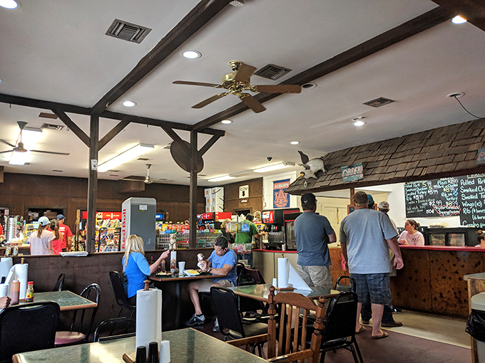 No fancy frills here&mdash;just wooden tables, ceiling fans, and the promise of barbecue that will haunt your dreams in the best possible way.