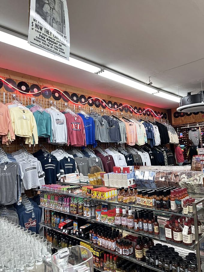 The vinyl record border adds musical flair above racks of Nashville apparel. Even your wardrobe deserves a soundtrack.