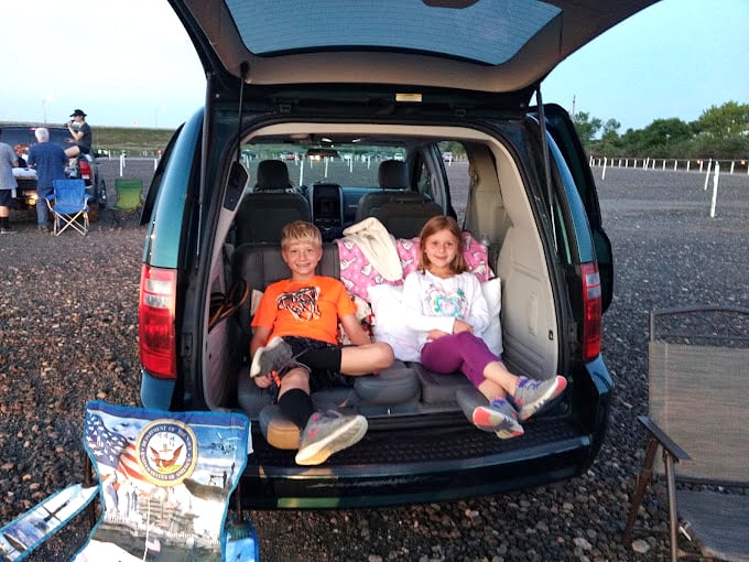 The back of an SUV becomes the world's coziest theater for these young movie buffs&mdash;pajamas optional, excitement mandatory.