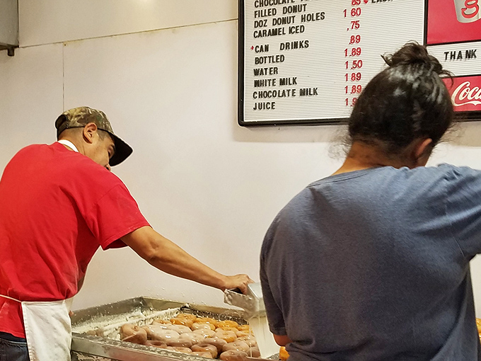 Behind the scenes, the donut-making process continues as it has for generations—no fancy equipment, just time-honored techniques and simple dedication.