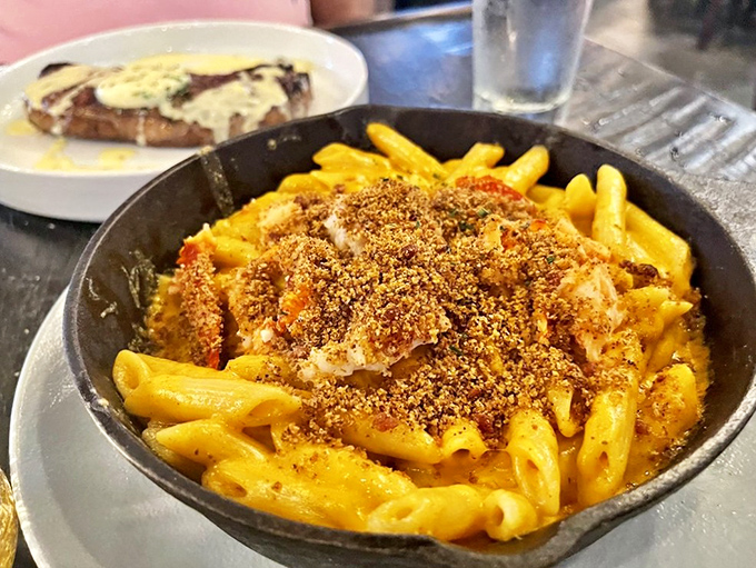 Mac and cheese that redefines comfort food. That golden crust is the edible equivalent of a warm hug from someone who really gets you.