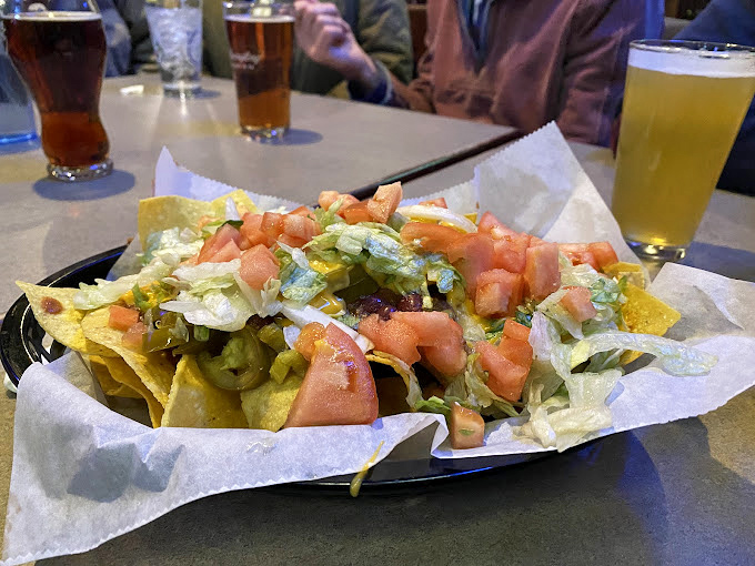 These loaded nachos aren't just a starter&mdash;they're a commitment. A glorious mountain of chips, cheese, and toppings that demands to be shared. 