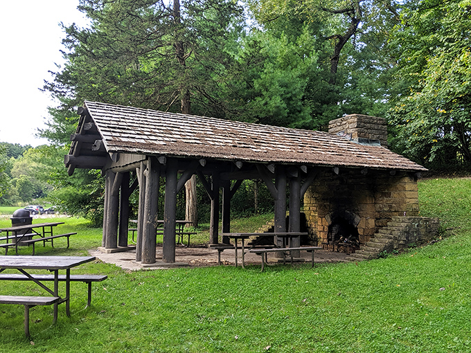 This picnic shelter with its stone fireplace isn't just functional&mdash;it's architectural poetry in log and limestone. S'mores have never felt so historically significant.