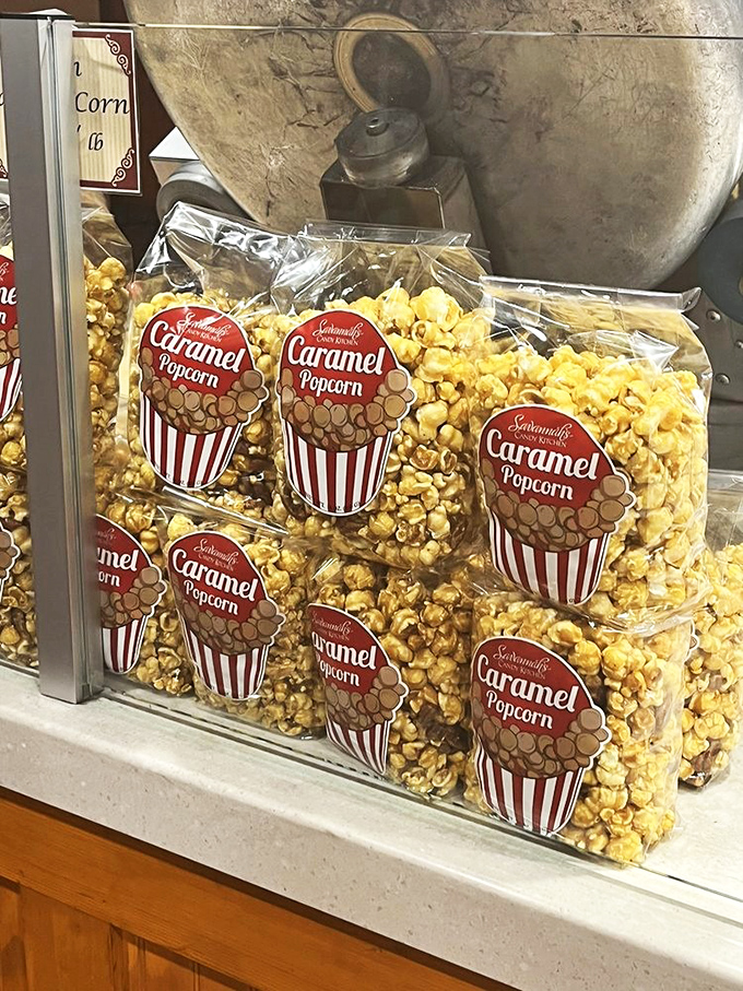 Caramel popcorn bags stacked with military precision, ready to deploy their sweet-salty assault on your taste buds. Movie theaters everywhere should be taking notes.