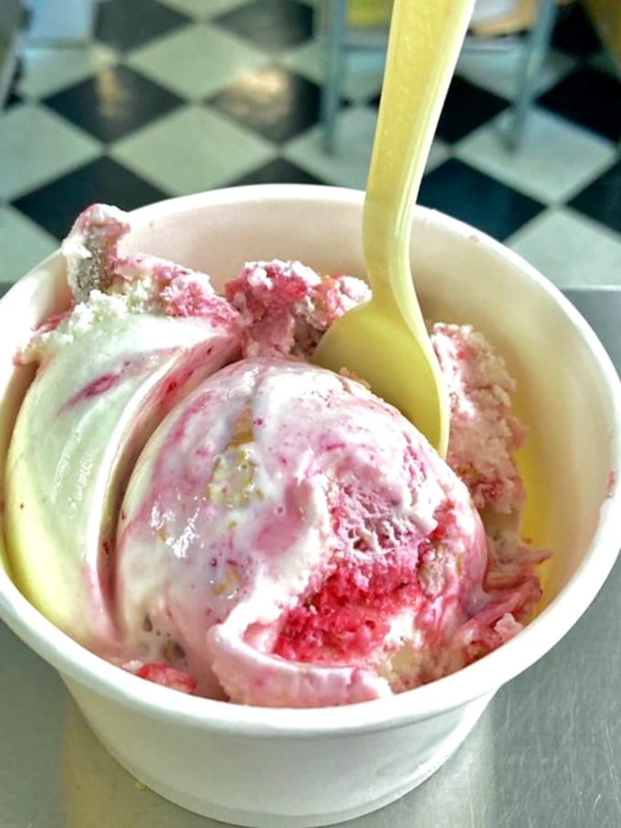 Strawberry swirl that looks like a watercolor painting you can eat. The kind of ice cream that demands to be savored slowly.