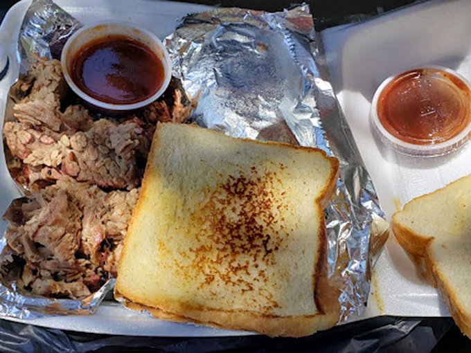 Simple pleasures: pulled pork with just enough sauce to complement, not drown, alongside Texas toast that's ready for sandwich-making improvisation.
