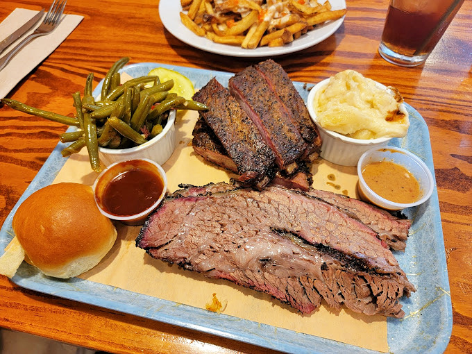 When your plate arrives with both brisket and ribs, it's like the universe saying, "You've made excellent life choices today."