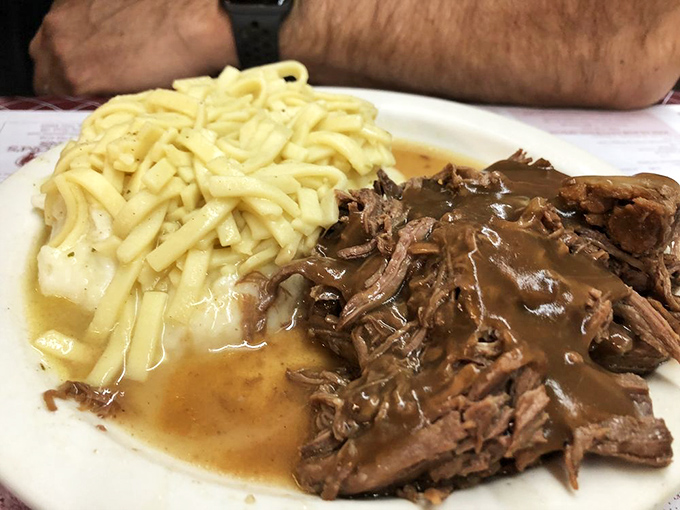 This isn't just roast beef&mdash;it's a tender testament to patience. Swimming in gravy alongside noodles that have clearly been taking notes from grandma's cookbook. 
