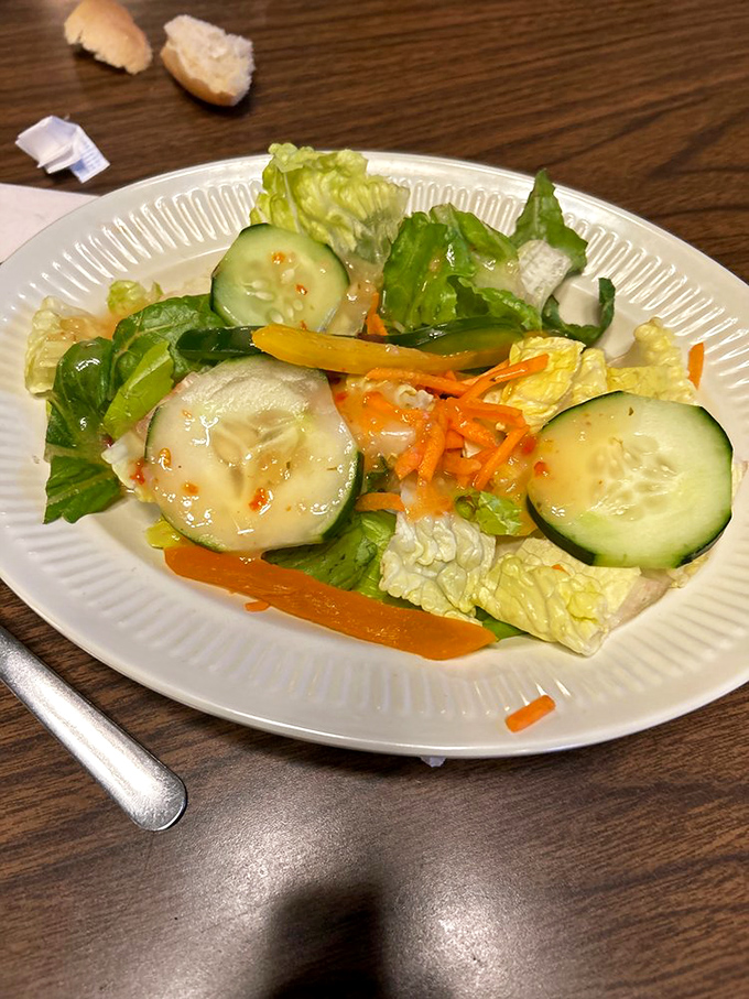 Even the salad looks like it's having a good time! Crisp vegetables playing nicely together&mdash;proof that Mountain Gate doesn't treat its greens as mere obligation.