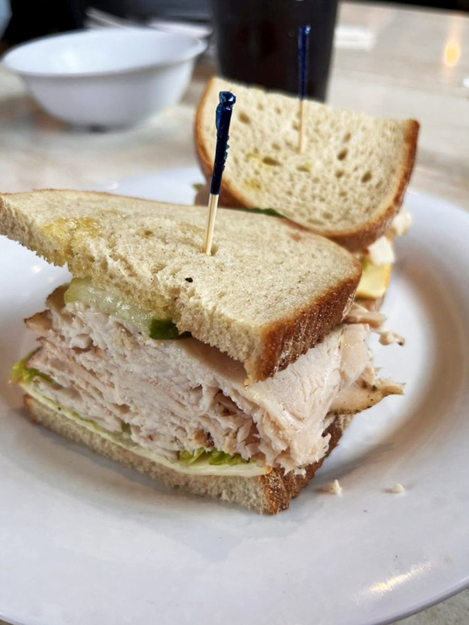 Turkey stacked higher than your summer reading list, this sandwich doesn't just satisfy hunger&mdash;it conquers it. Note the perfect bread-to-meat ratio.