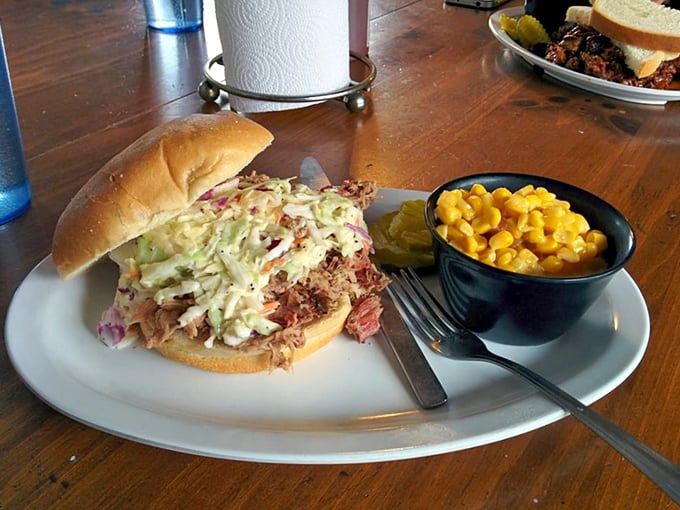 The pulled pork sandwich&mdash;where coleslaw and meat perform a beautiful dance. It's like a barbecue hug between two pieces of bread.