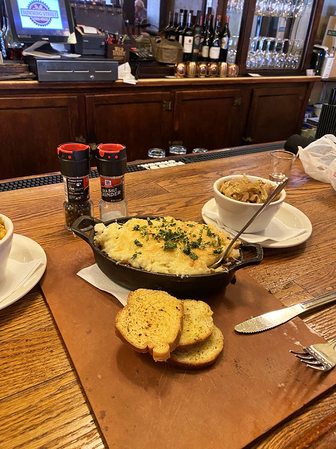 The humble shepherd's pie elevated to royal status, where cheese-crusted potatoes meet savory filling in a union blessed by culinary gods.