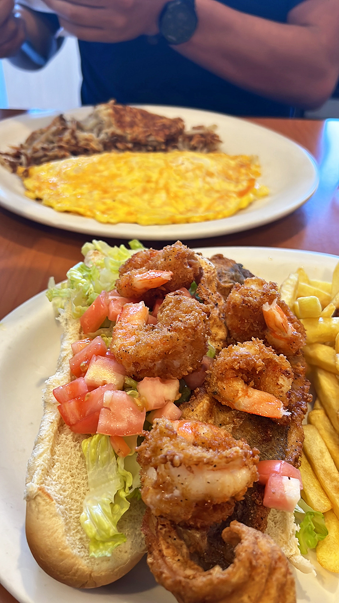 A seafood sandwich that would make coastal chefs nod in respect. Fresh shrimp, crisp lettuce, and a roll that knows its supporting role perfectly.