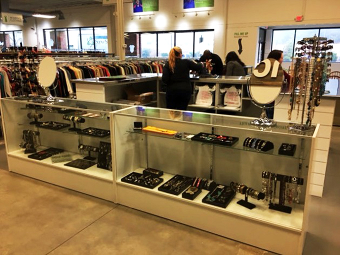 Gleaming jewelry displays and neatly organized clothing racks showcase NLB's commitment to presentation that rivals upscale retail stores.