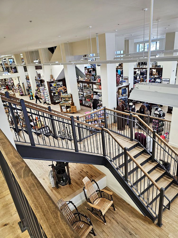 These aren't just stairs&mdash;they're a journey between retail dimensions, connecting floors of discovery while vintage chairs offer respite for weary shoppers.