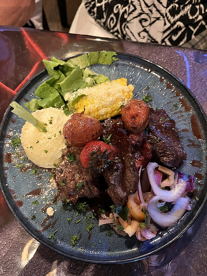 Land meets sea on this artfully plated steak dinner. The corn and potatoes didn't just come along for the ride&mdash;they're essential co-stars.