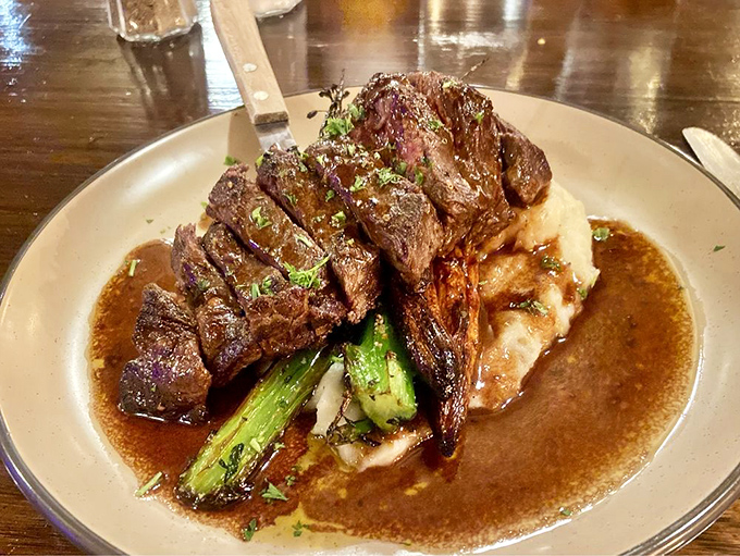 Steak sliced and presented with such care, it's like the chef is showing off family photos of their most accomplished child.