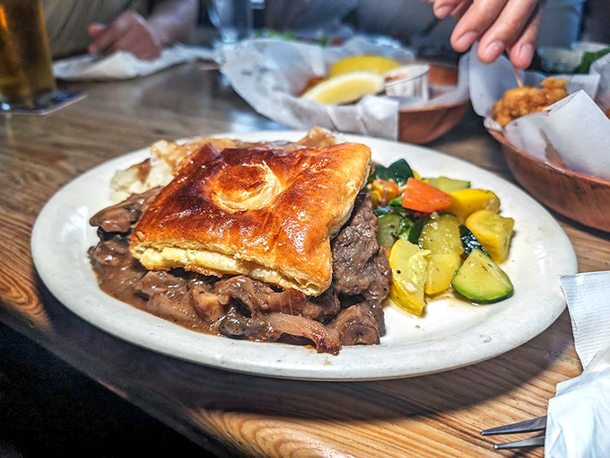 Not just a pie but an edible love letter from Britain&mdash;flaky pastry embracing tender steak and mushrooms in a gravy that deserves poetry.