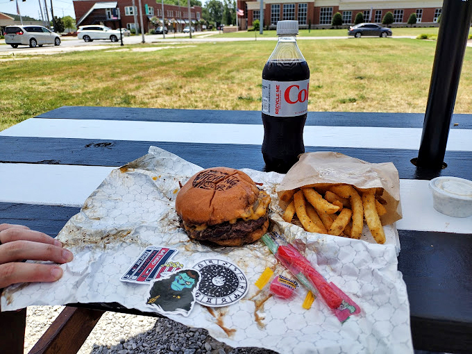 Every sticker tells a story &ndash; the collection adorning the serving window creating a visual scrapbook of pop culture, horror films, and local flavor.