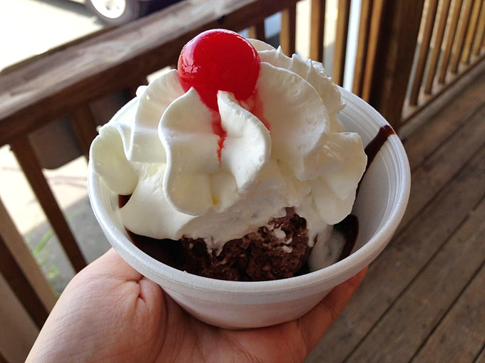 A sundae that understands the importance of proper whipped cream-to-cherry ratio &ndash; architectural brilliance in dessert form.