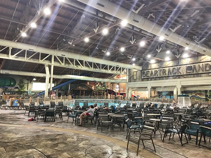 "Water park base camp" &ndash; where towels multiply mysteriously, snacks disappear at alarming rates, and parents perfect the art of the thirty-second catnap between slide requests.