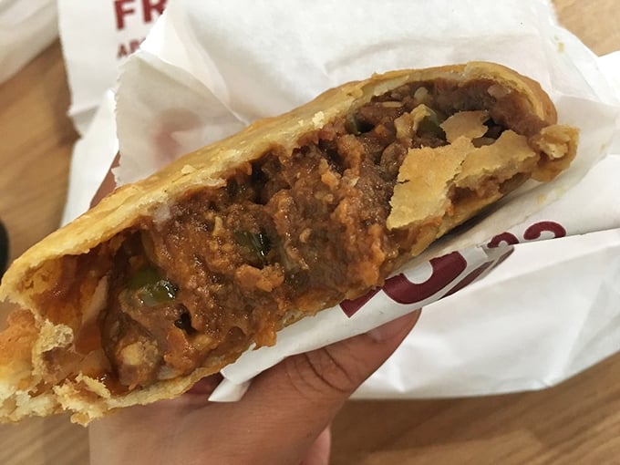 Cut in half to reveal its secrets, this Tex-Mex pie delivers a spicy symphony in every bite. Portable perfection that puts burritos on notice.