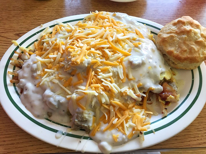 "The Slop" lives up to its magnificent name—a mountain of breakfast goodness smothered in gravy and crowned with cheese. Dignity optional, satisfaction guaranteed.