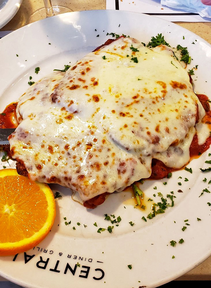 Veal parmesan that's having its glamour shot moment. That melted cheese pull would make Instagram influencers weep with jealousy.