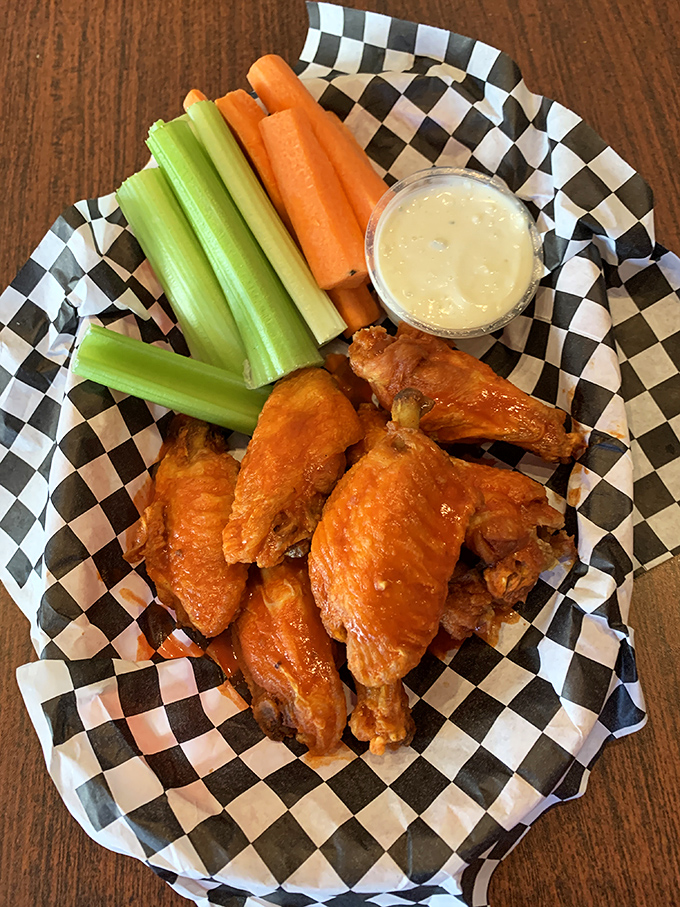 These wings aren't just playing backup to the cheesesteaks; they're auditioning for their own headline act with crispy, saucy confidence.