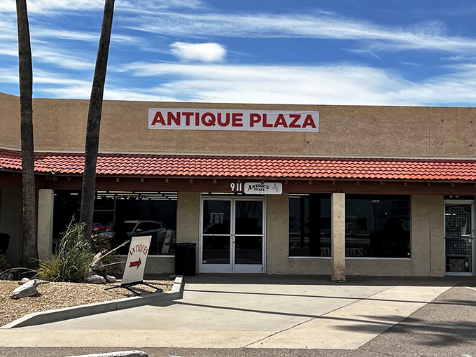 Antique Plaza's charming storefront blends into downtown Mesa's historic vibe. The sign points the way to yesterday's treasures.