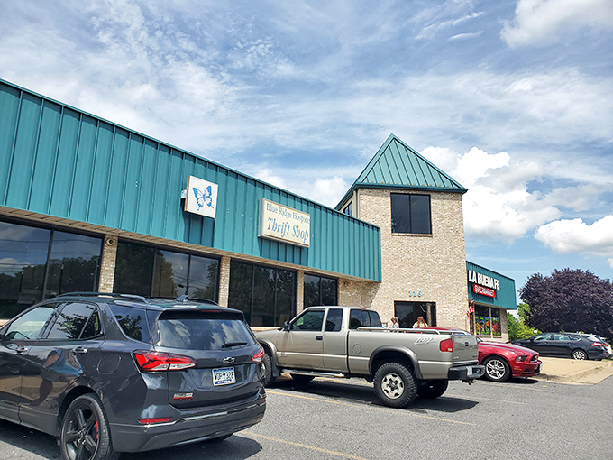 That distinctive teal roof signals you've arrived at bargain paradise – Blue Ridge Hospice Thrift's treasures await!