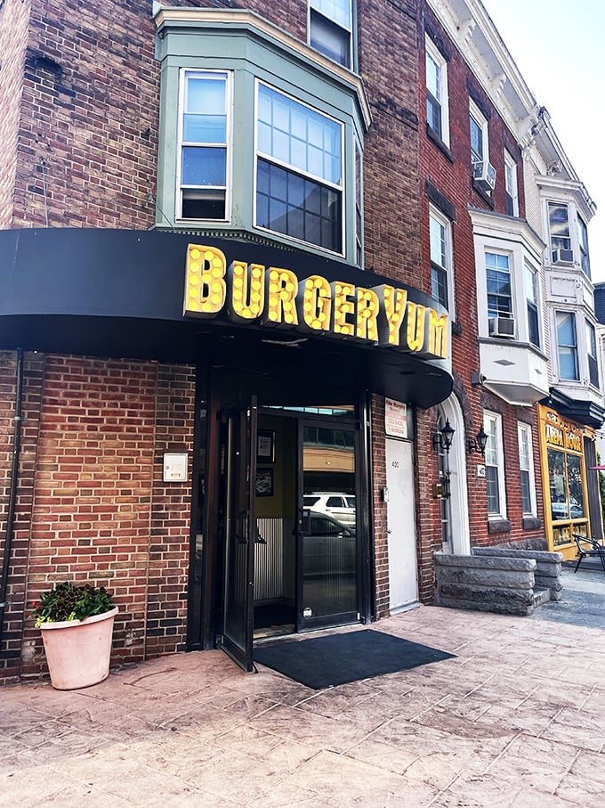 Burger Yum's glowing yellow sign is like a lighthouse, guiding hungry souls to burger salvation in downtown Harrisburg. 