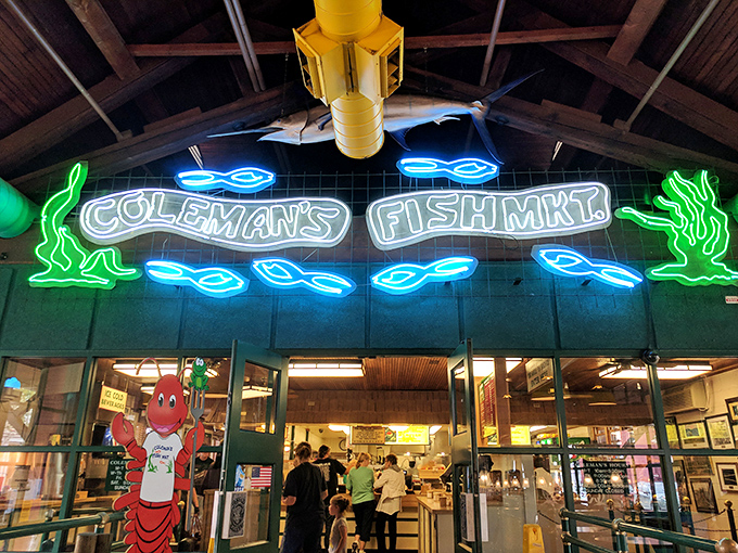 Coleman's neon sign: "When neon fish swim above your head, you know you've found seafood nirvana. Coleman's glows with fishy promises."