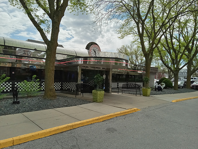 Drake Diner: This gleaming silver diner car is a time machine to when breakfast was serious business. The checkered trim promises classic American morning magic.