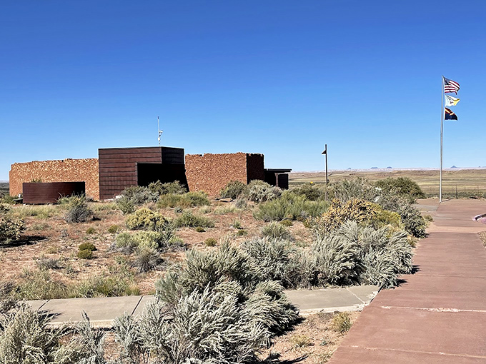Homolovi's visitor center rises from the desert floor like a modern tribute to ancient Hopi architecture.